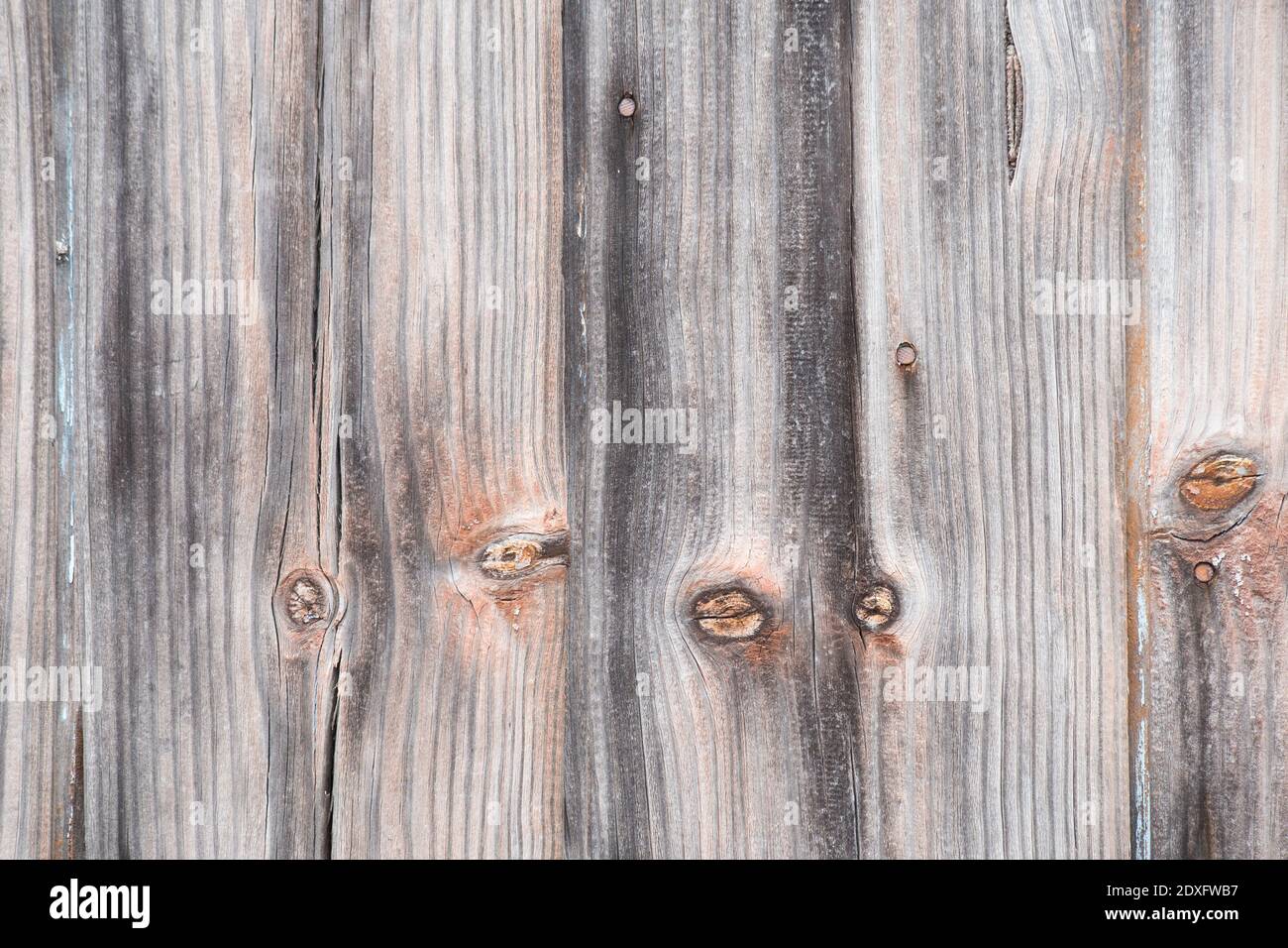 A Old wood background with totally worn out paint, wood texture with ...
