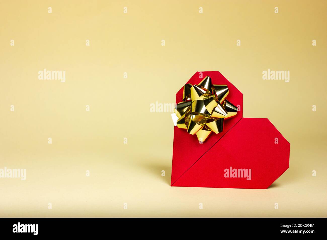 Big red heart on a yellow background. Happy valentine day greetings ...