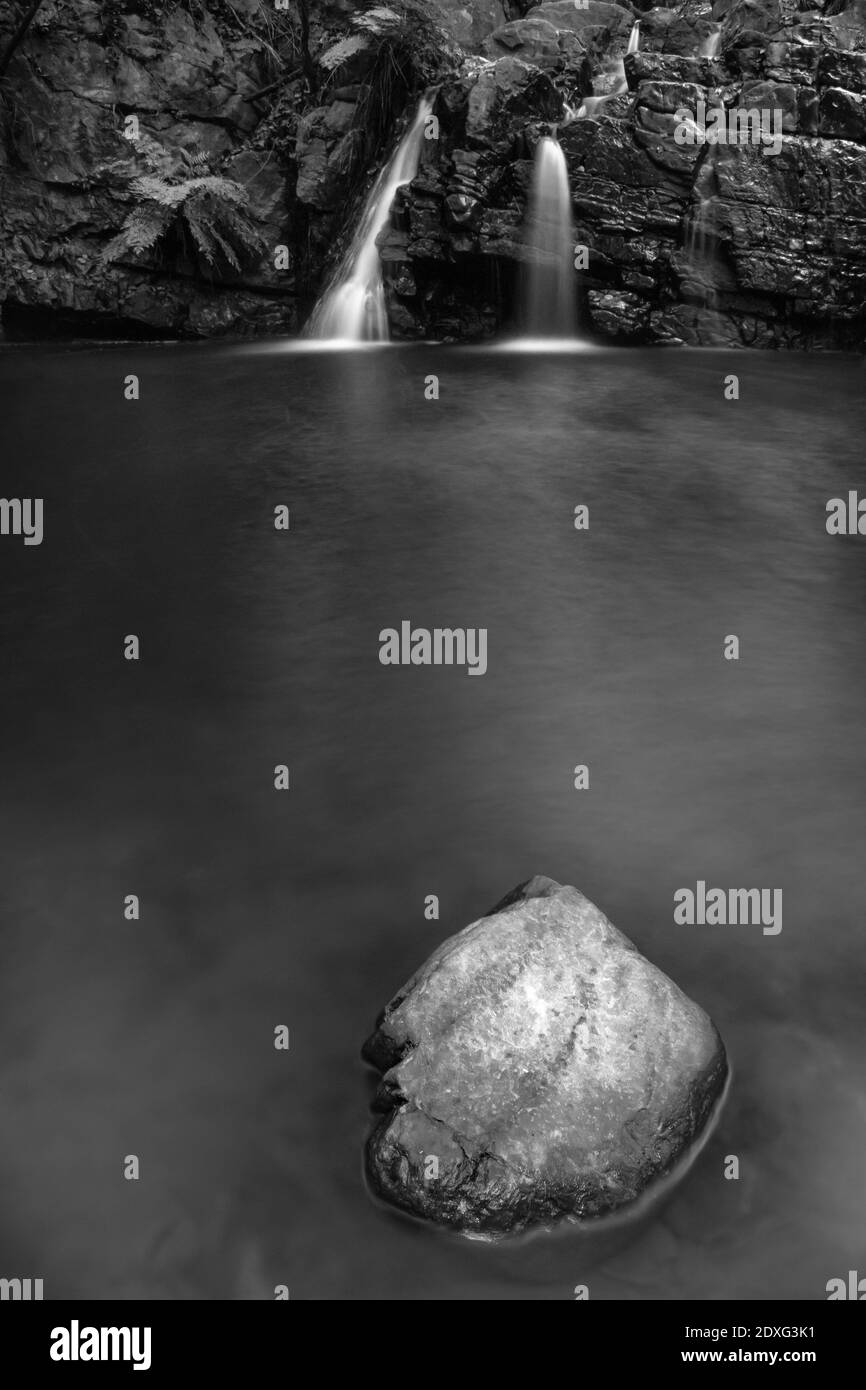 Water Flowing Through Rocks Stock Photo - Alamy