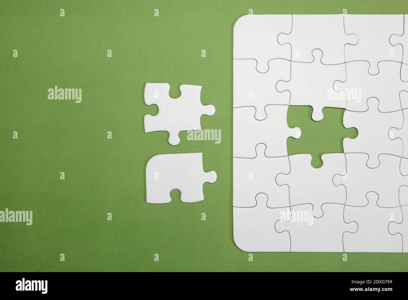 A incomplete puzzle with one piece missing to complete it. there are ...