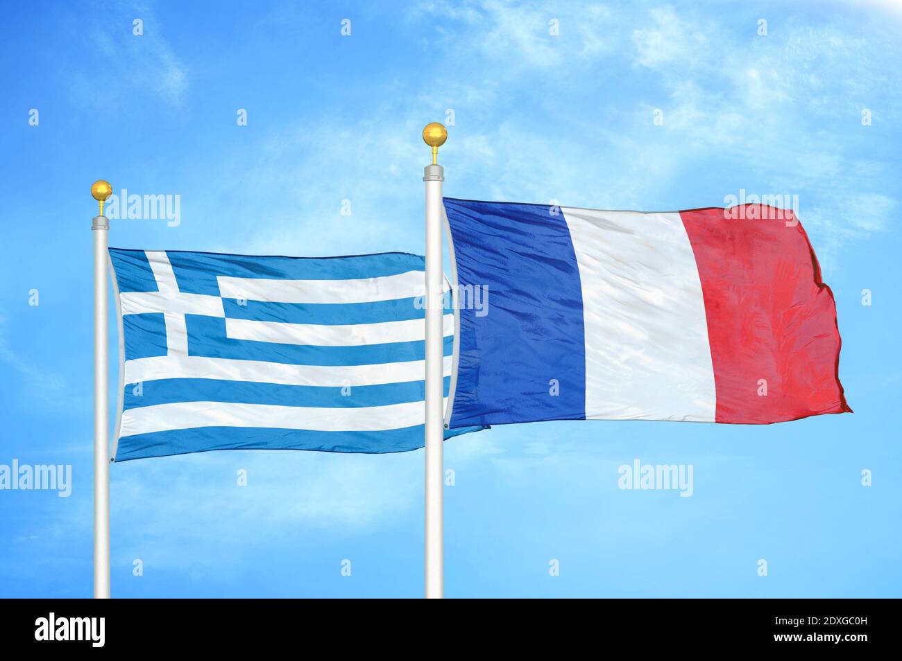 Greece and France two flags on flagpoles and blue sky Stock Photo - Alamy