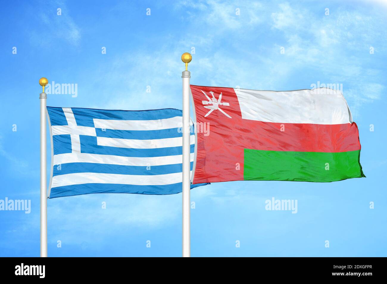 Greece and Oman two flags on flagpoles and blue sky Stock Photo - Alamy