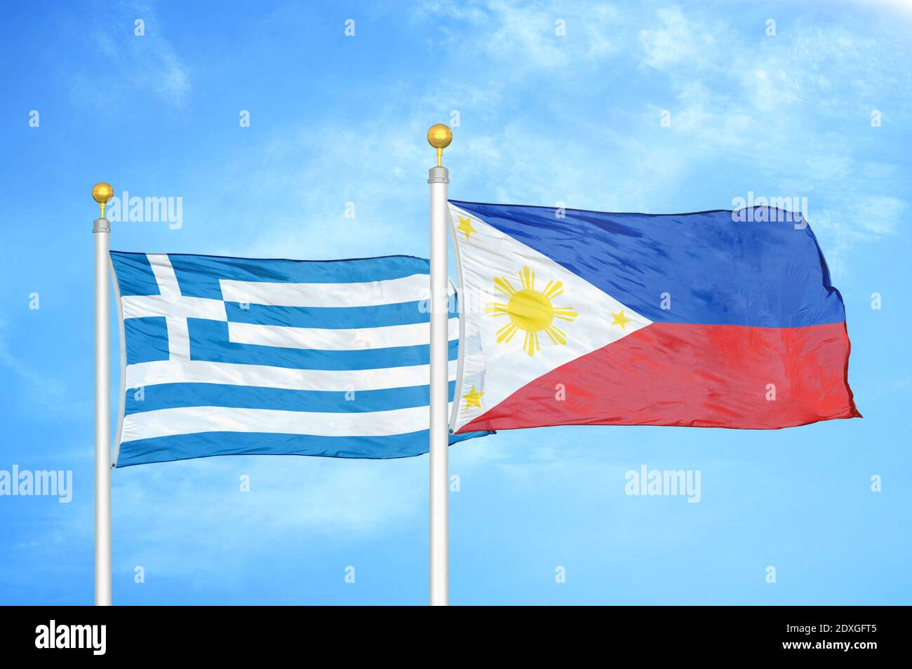 Greece and Philippines two flags on flagpoles and blue sky Stock Photo ...