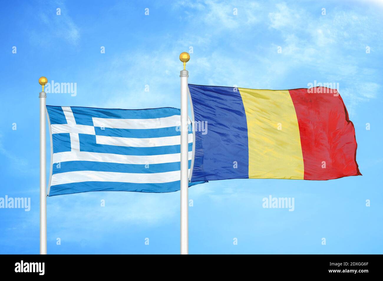 Greece and Romania two flags on flagpoles and blue sky Stock Photo - Alamy