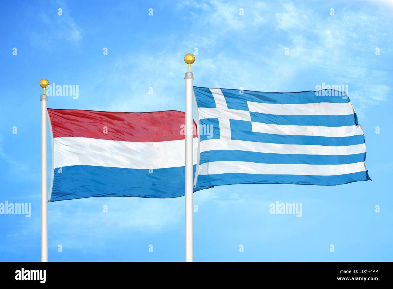 Netherlands and Greece two flags on flagpoles and blue sky Stock Photo ...