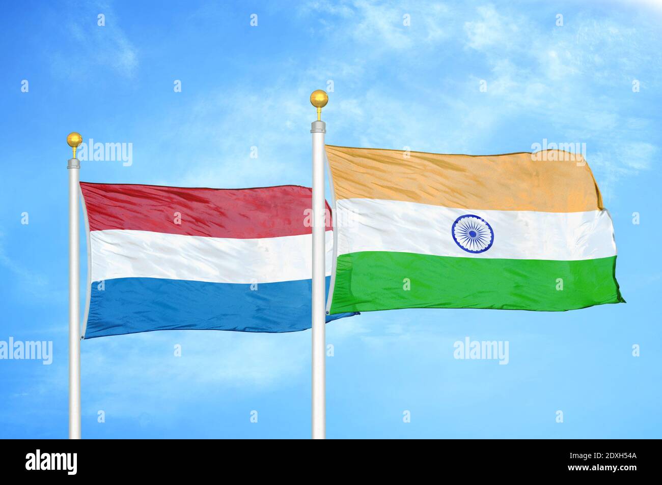 Netherlands and India two flags on flagpoles and blue sky Stock Photo ...
