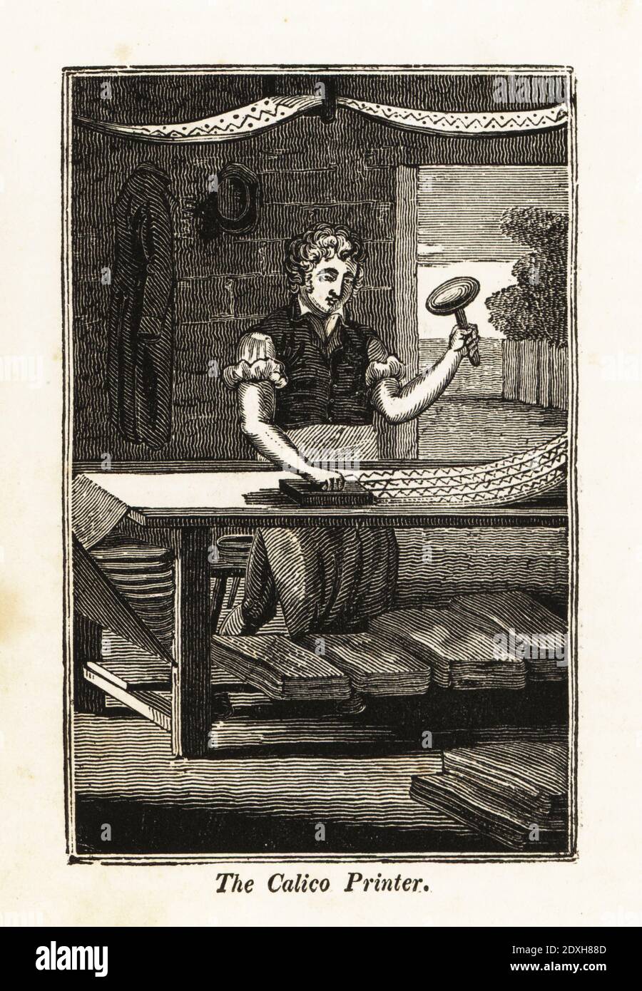 Calico-printer printing fabric with a woodblock in an atelier. Pattern ...