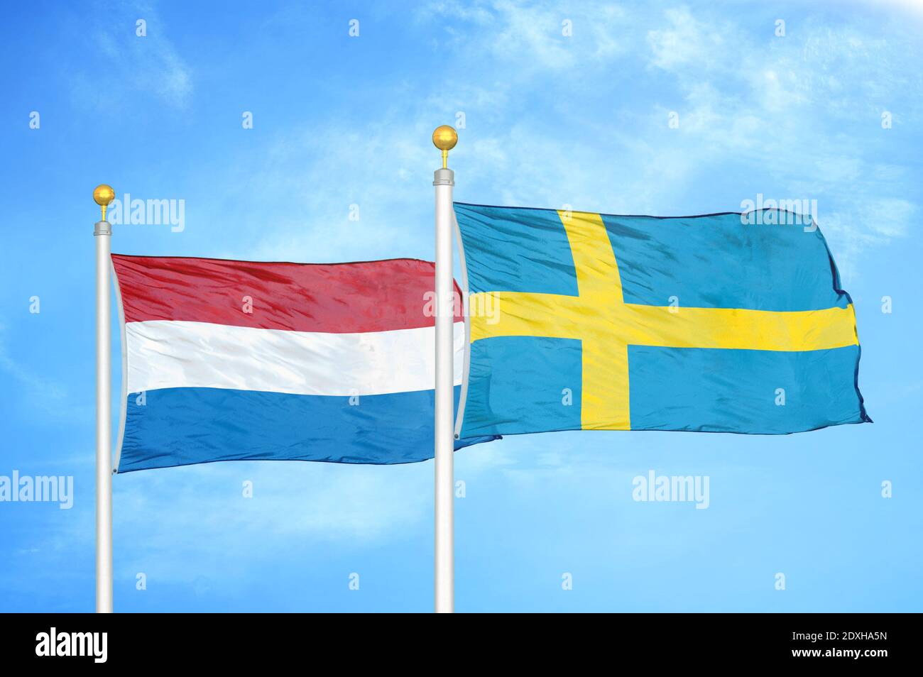 Netherlands and Sweden two flags on flagpoles and blue sky Stock Photo ...