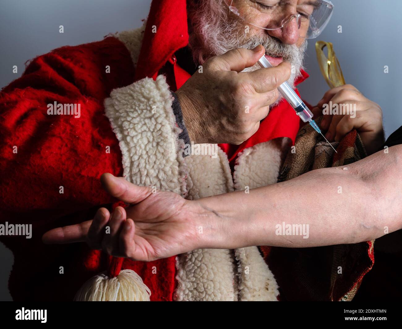 Santa Claus is ready to deliver vaccination to humanity Stock Photo - Alamy