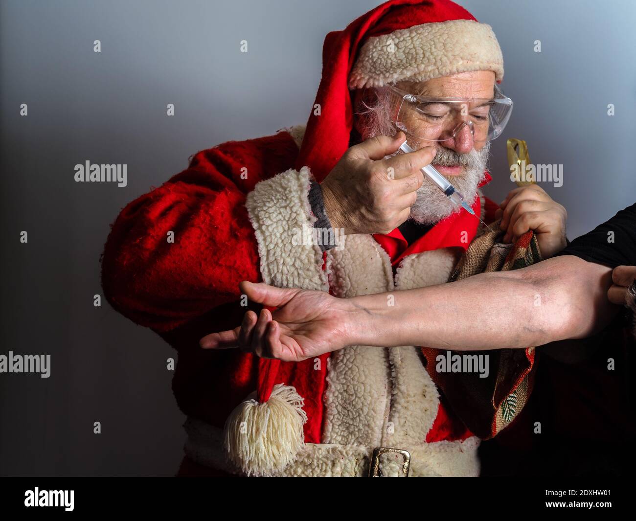 Santa Claus is ready to deliver vaccination to humanity Stock Photo - Alamy