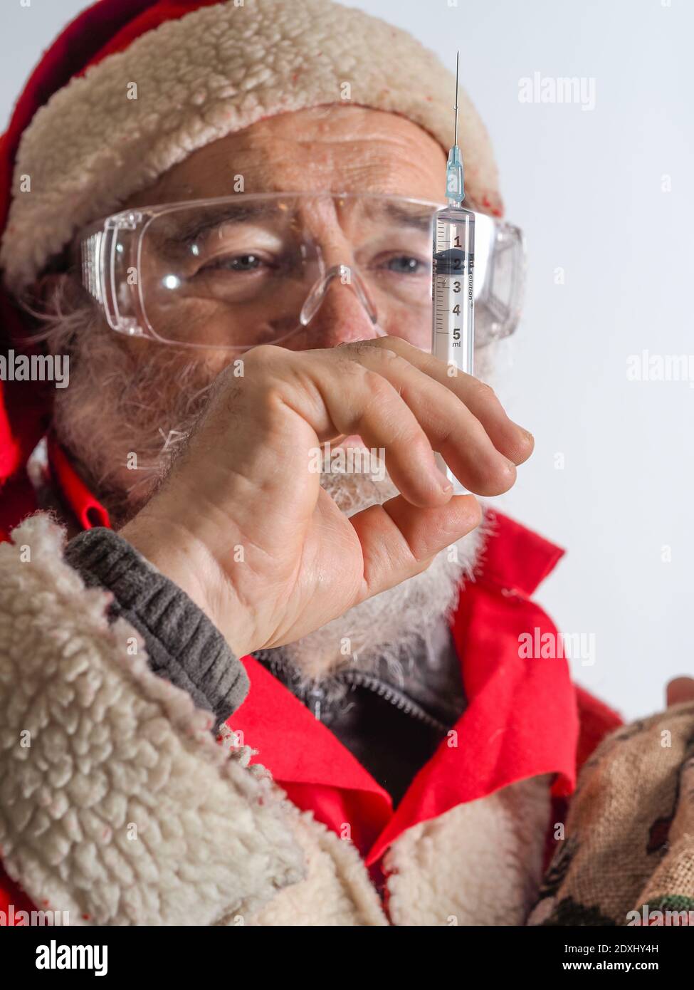 Santa Claus is ready to deliver vaccination to humanity Stock Photo - Alamy