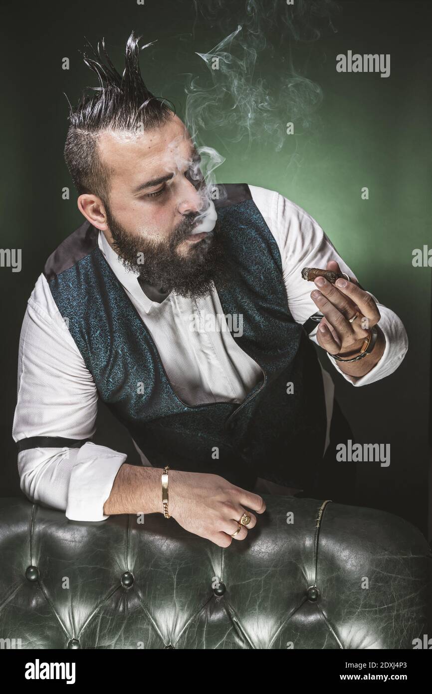 Gangster mafia man smoking cigar hi-res stock photography and images ...