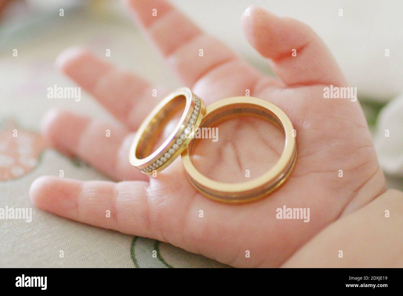 Baby hand holding finger ring hi-res stock photography and images - Alamy