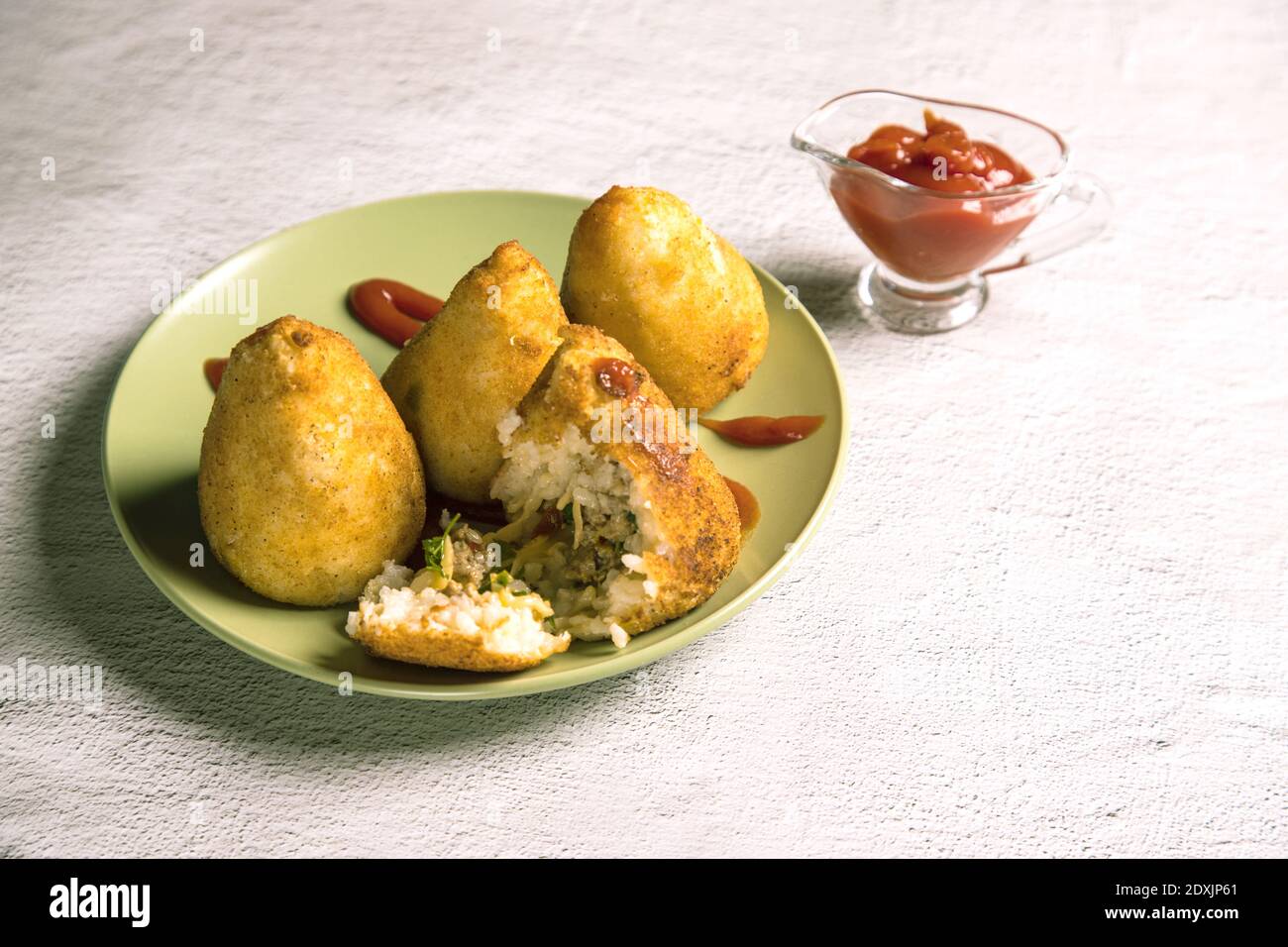Sicilian dish arancini-fried rice balls. Italian cuisine. Copy space ...