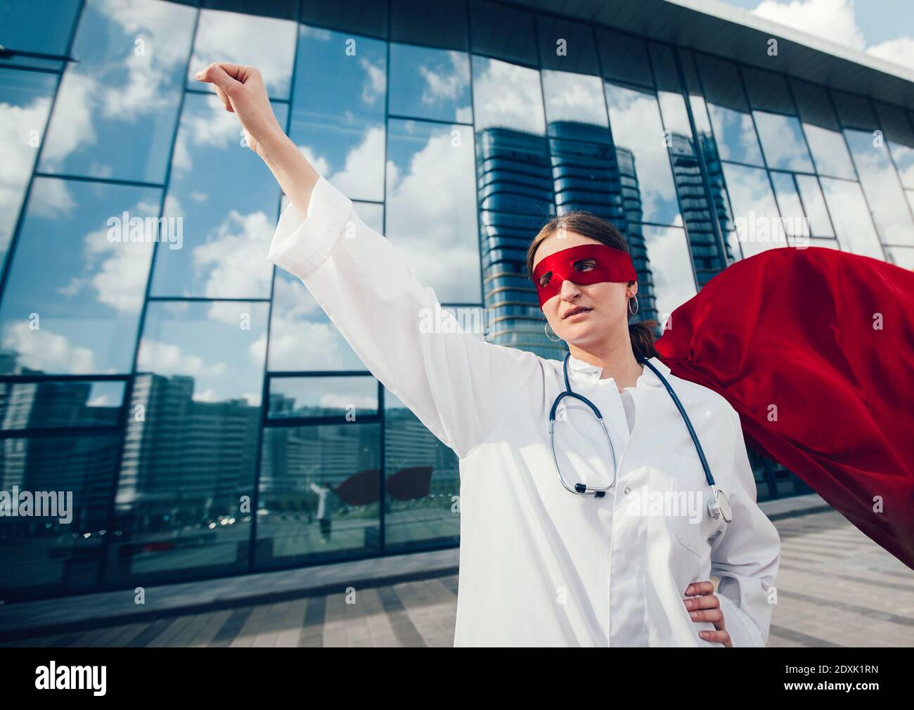 female doctor in a superhero Cape is ready to help Stock Photo - Alamy