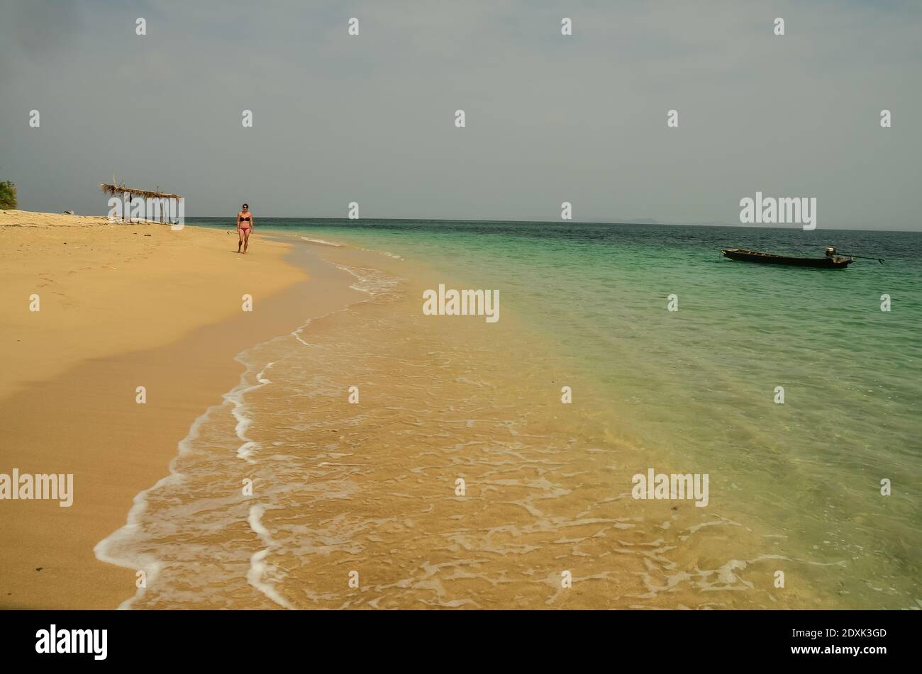 Woman walking at Gwa island beach in Myanmar Stock Photo - Alamy