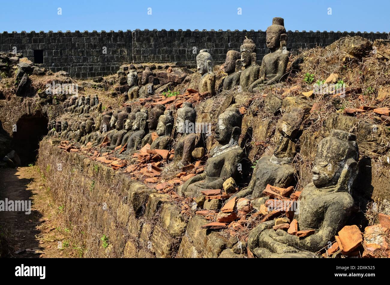 Ancient stone statues on a ruin in Mrauk U Myanmar Stock Photo - Alamy