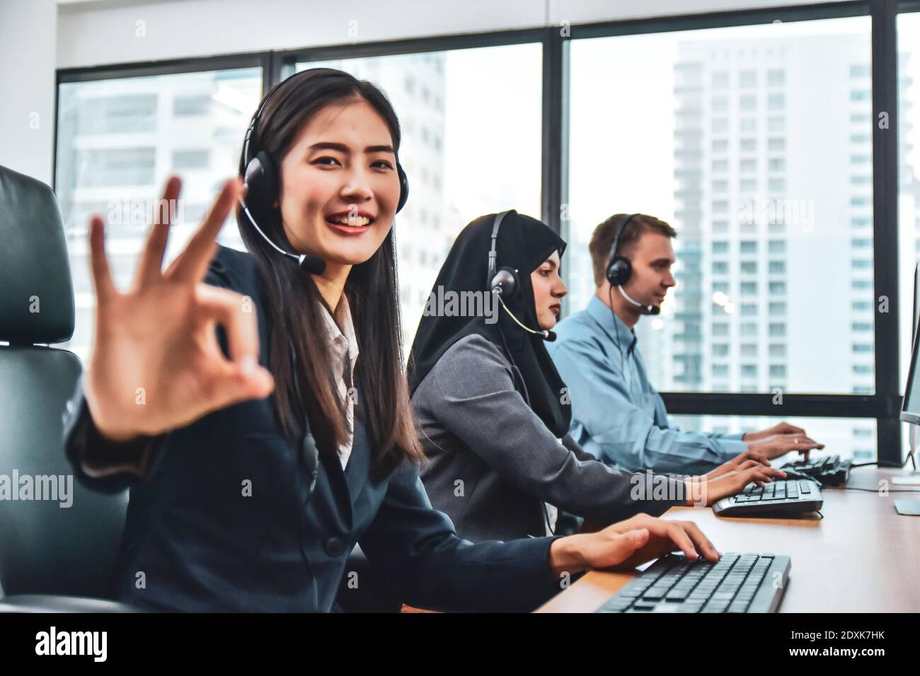 Call center team work in office consultation together contact hotline ...