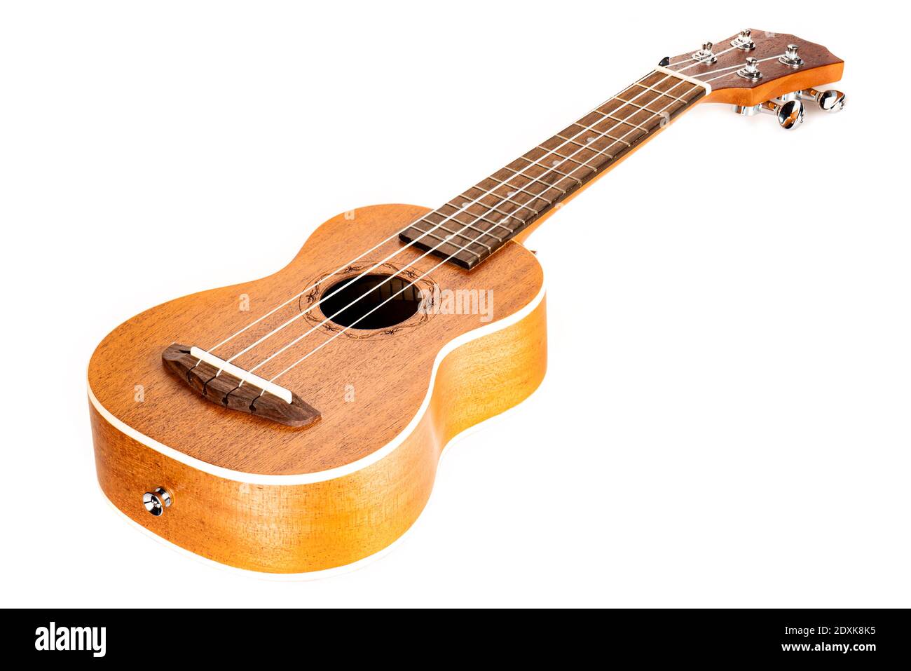 Brown guitar ukulele perspective view close up white background Stock ...