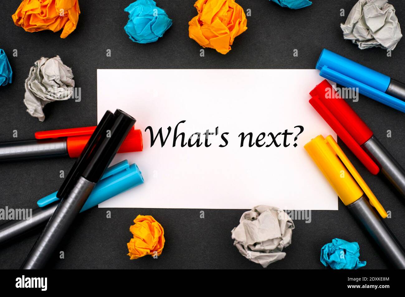 What's next? writing on paper blank with colour pens and crumpled paper ...