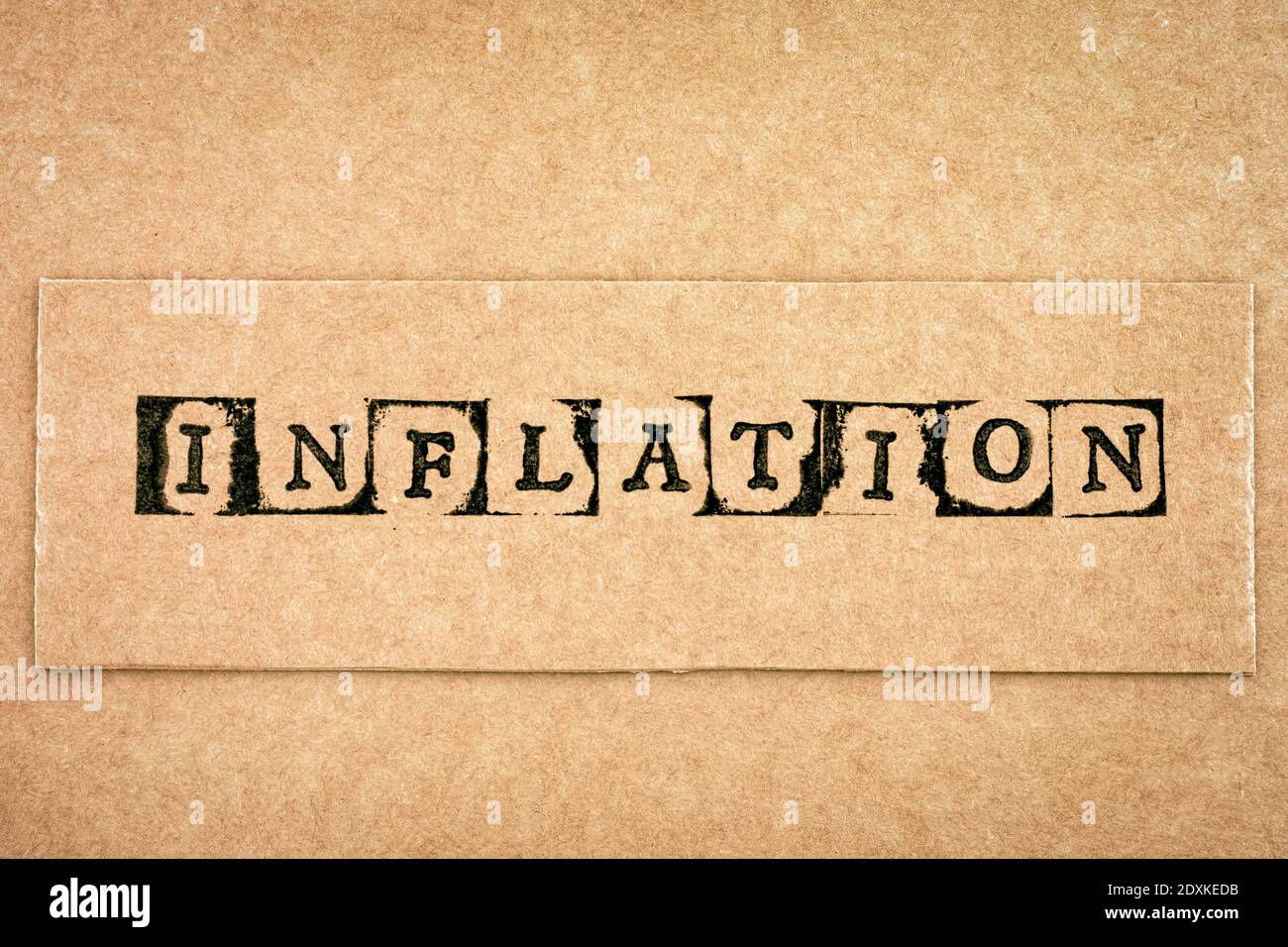 Cardboard with word Inflation made by black alphabet stamps Stock Photo ...