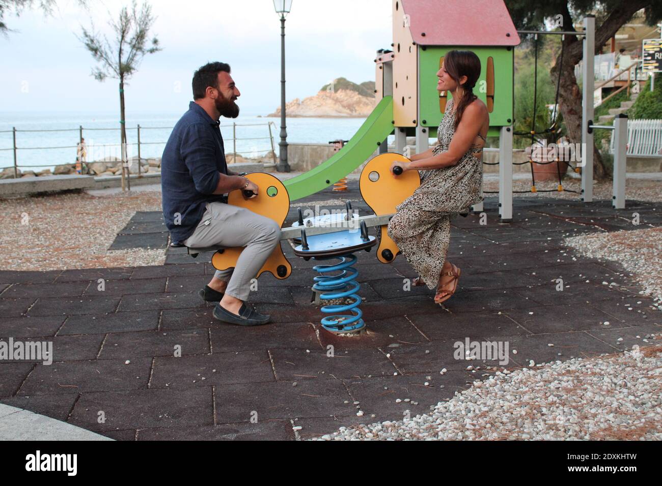 Man woman seesaw hi-res stock photography and images - Alamy