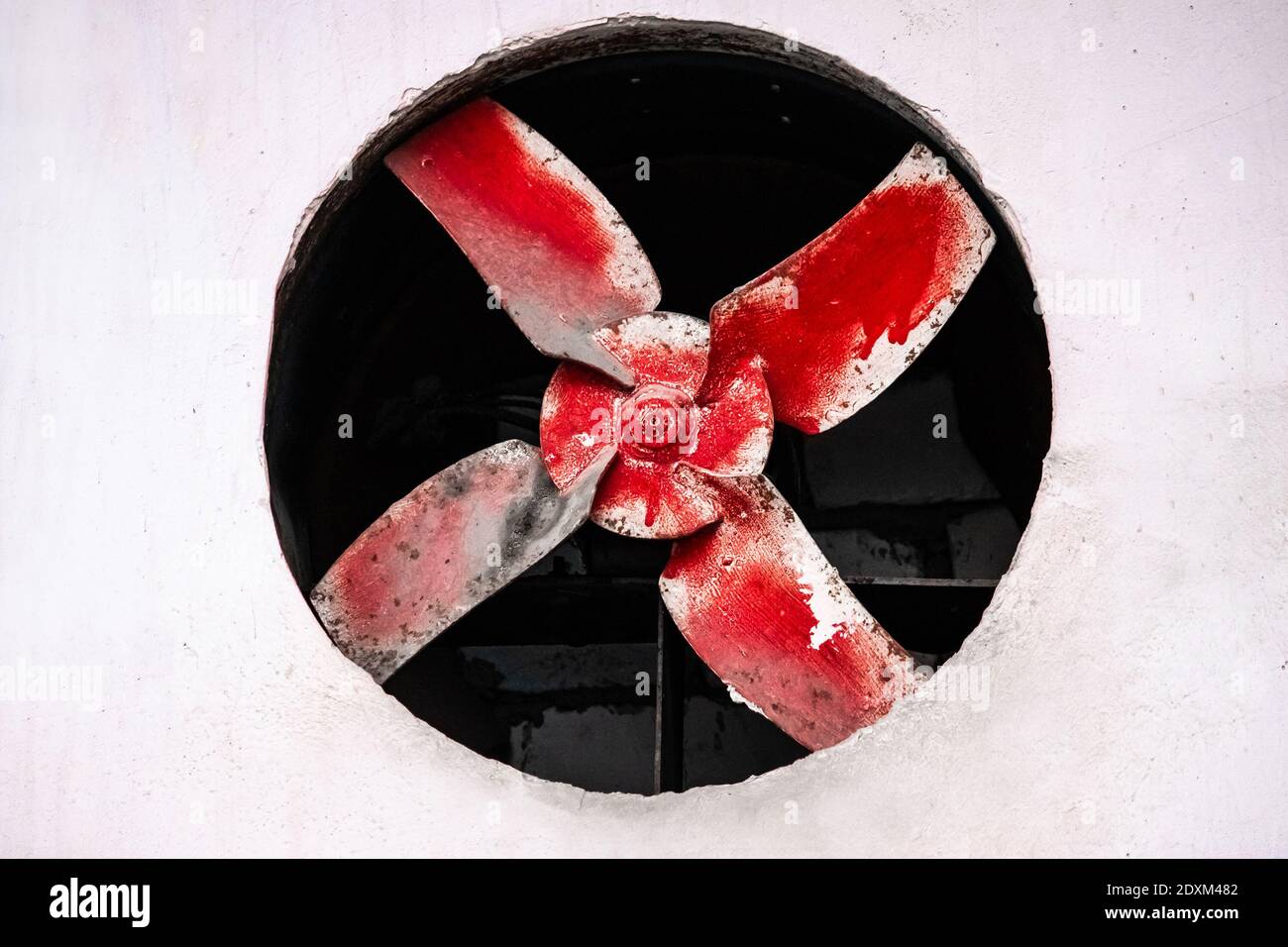 Big old red fan in the concrete wall Stock Photo - Alamy