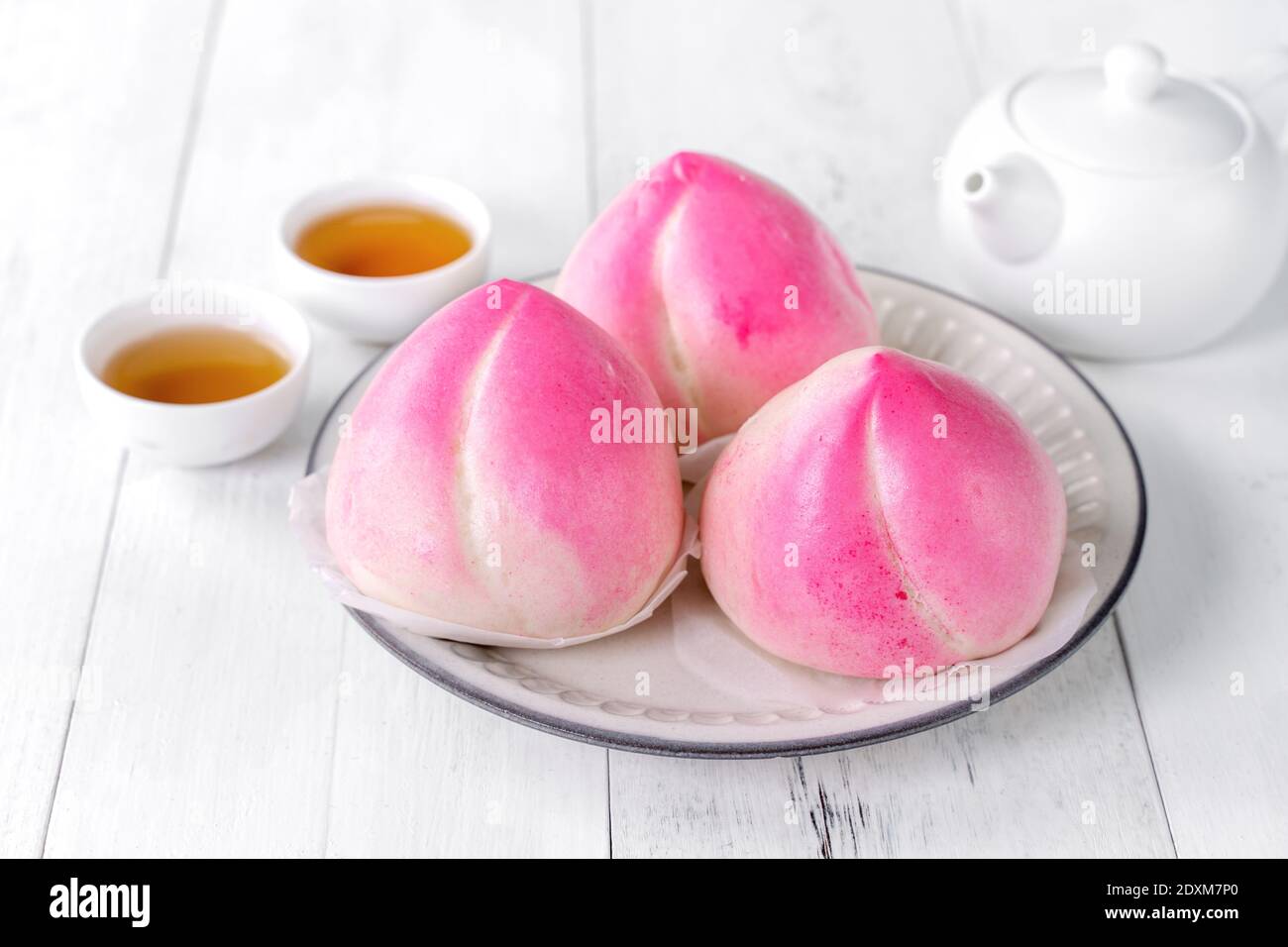 Pink Chinese peach birthday bun food named Longevity peach shoutao on ...