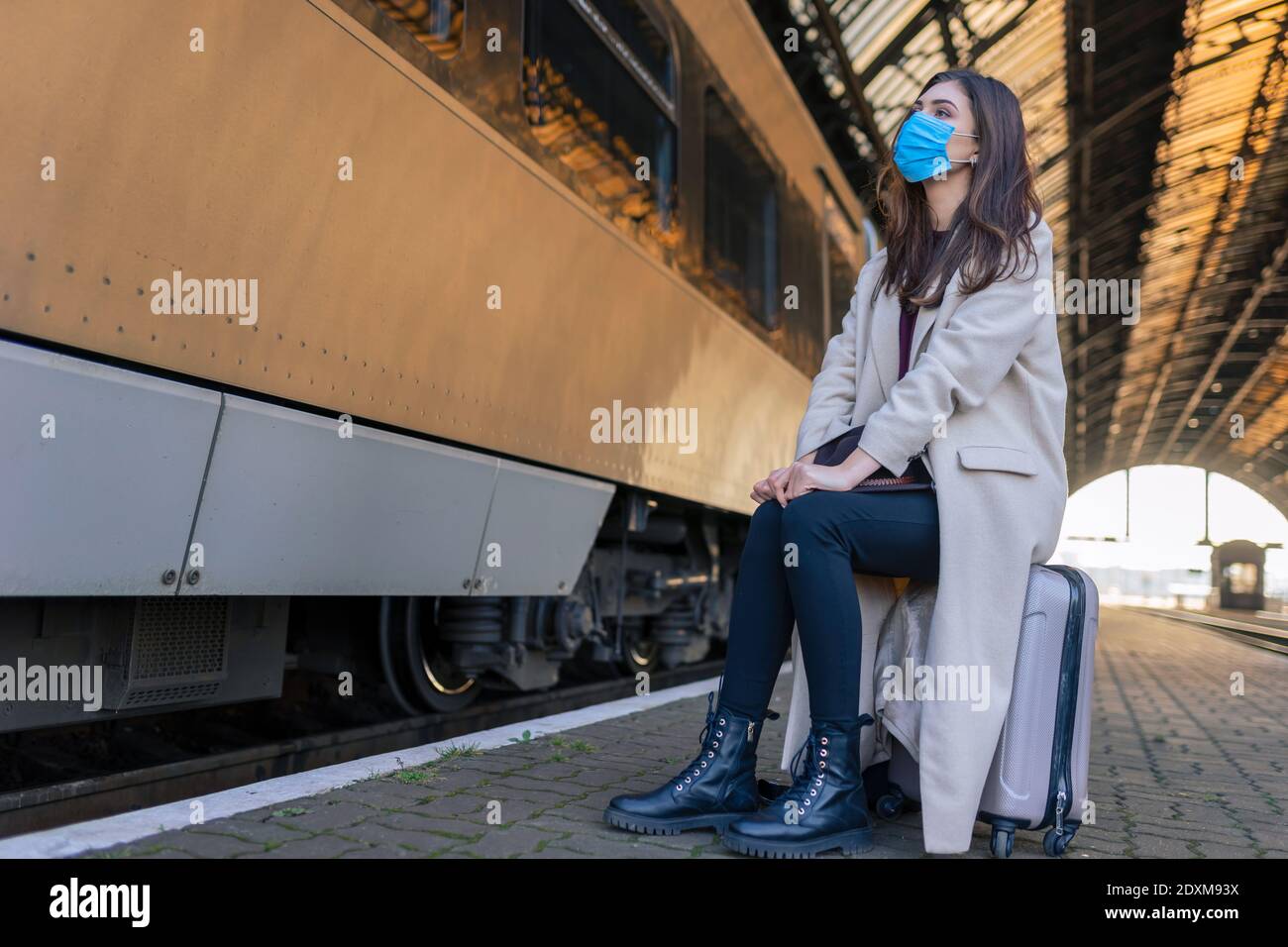 Sad girl on railway hi-res stock photography and images - Alamy