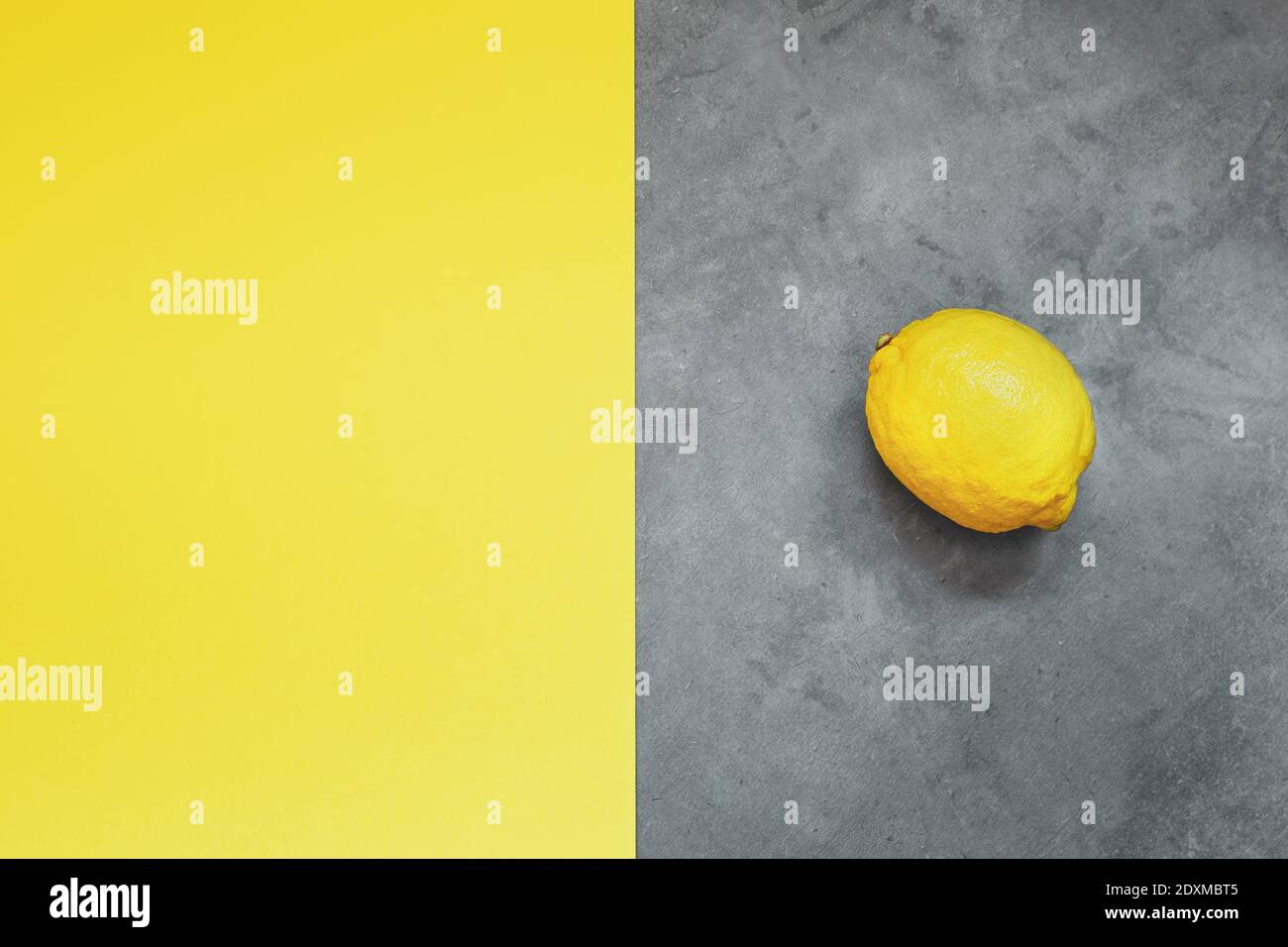 Lemon on yellow-gray background. Minimalistic geometric concept for ...