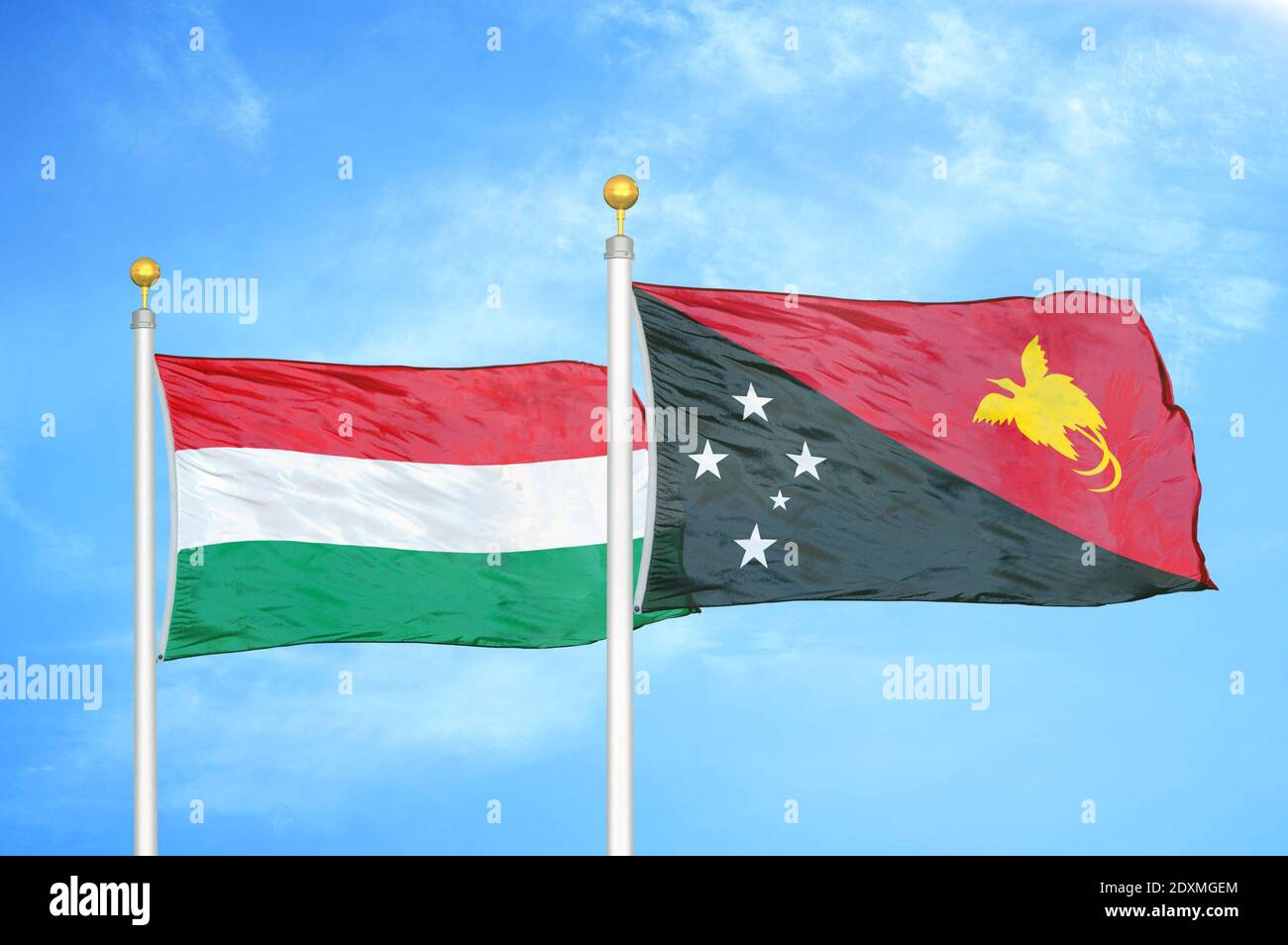 Hungary and Papua New Guinea two flags on flagpoles and blue cloudy sky Stock Photo - Alamy