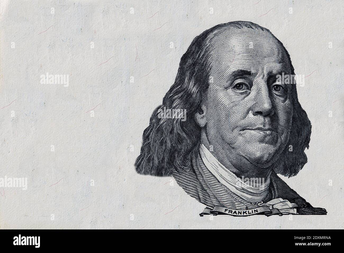 Benjamin Franklin cut on new 100 dollars banknote isolated on white ...