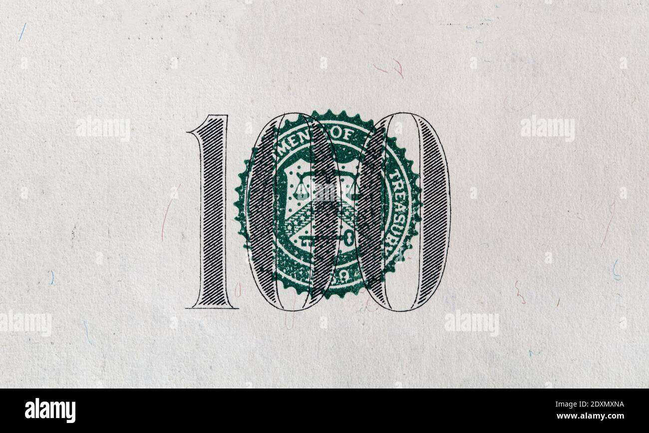 closeup of cut number 100 of dollar bill on white background Stock ...