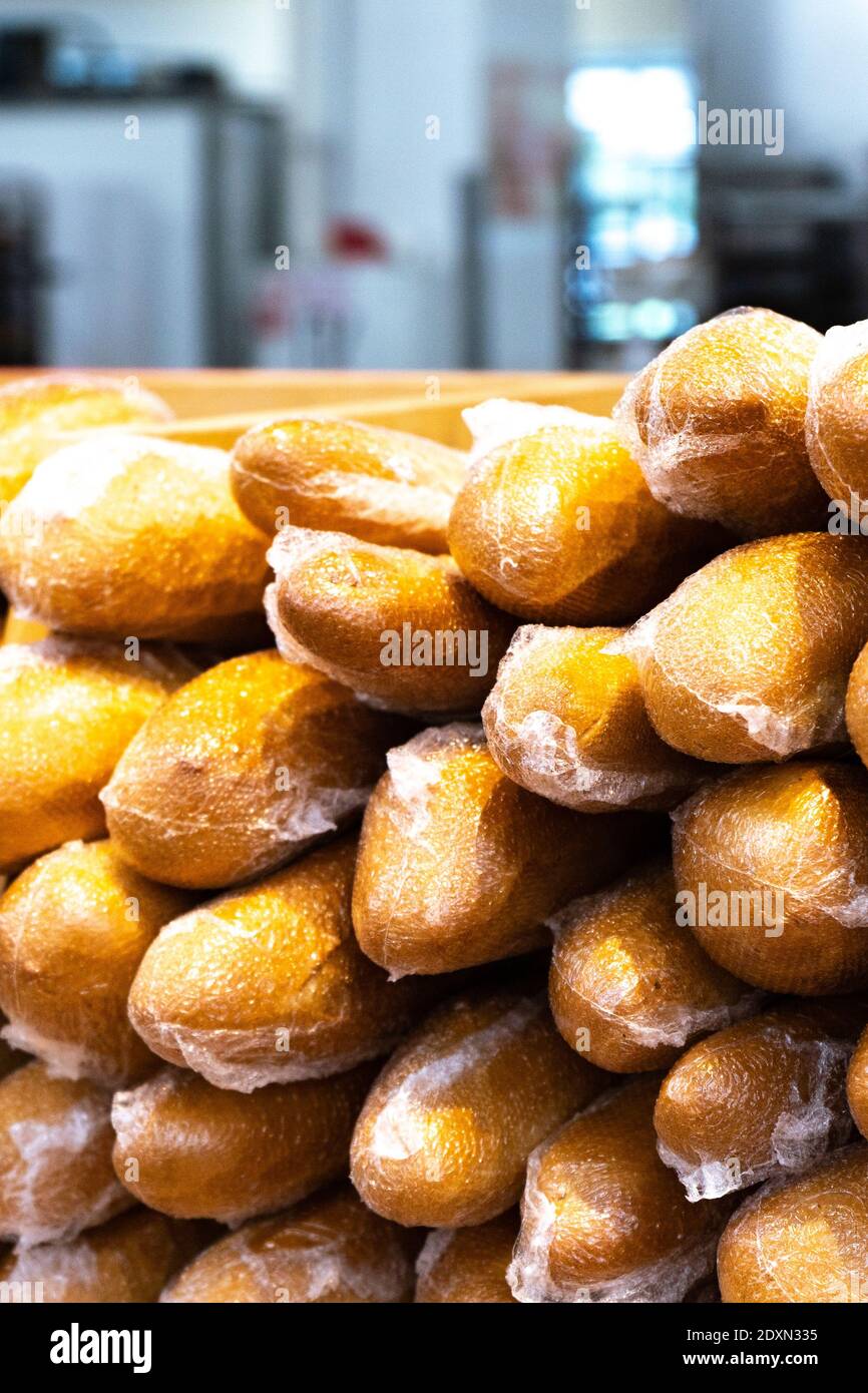 Lots of Large Fresh Bread Loaves in the Bakery Stock Photo - Alamy