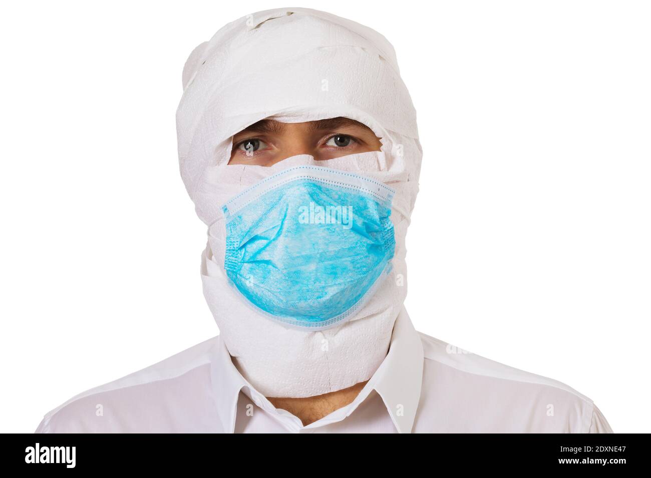 Man wrapped in toilet paper and wearing a medical mask isolated on ...