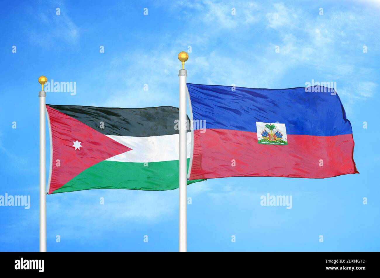Jordan and Haiti two flags on flagpoles and blue cloudy sky Stock Photo ...