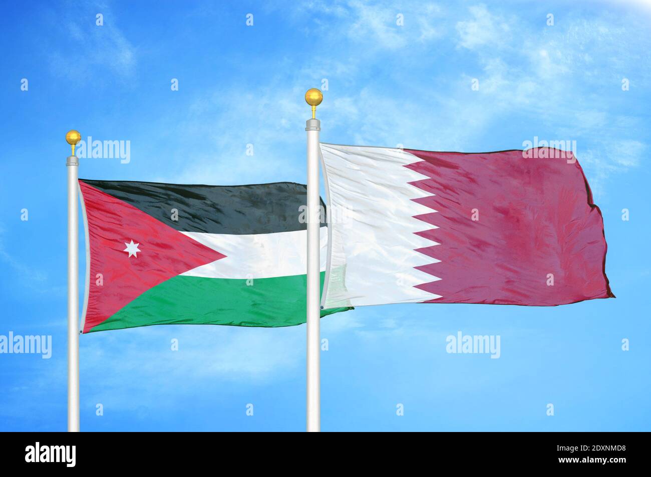 Jordan and Qatar two flags on flagpoles and blue cloudy sky Stock Photo ...