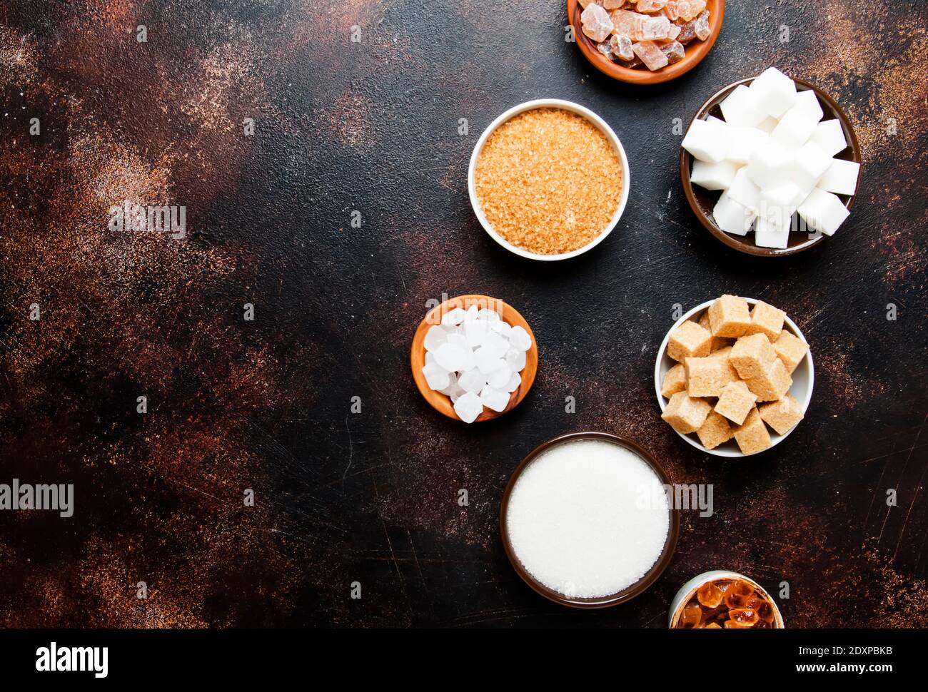 Different kinds of sugar in the assortment, top view Stock Photo - Alamy