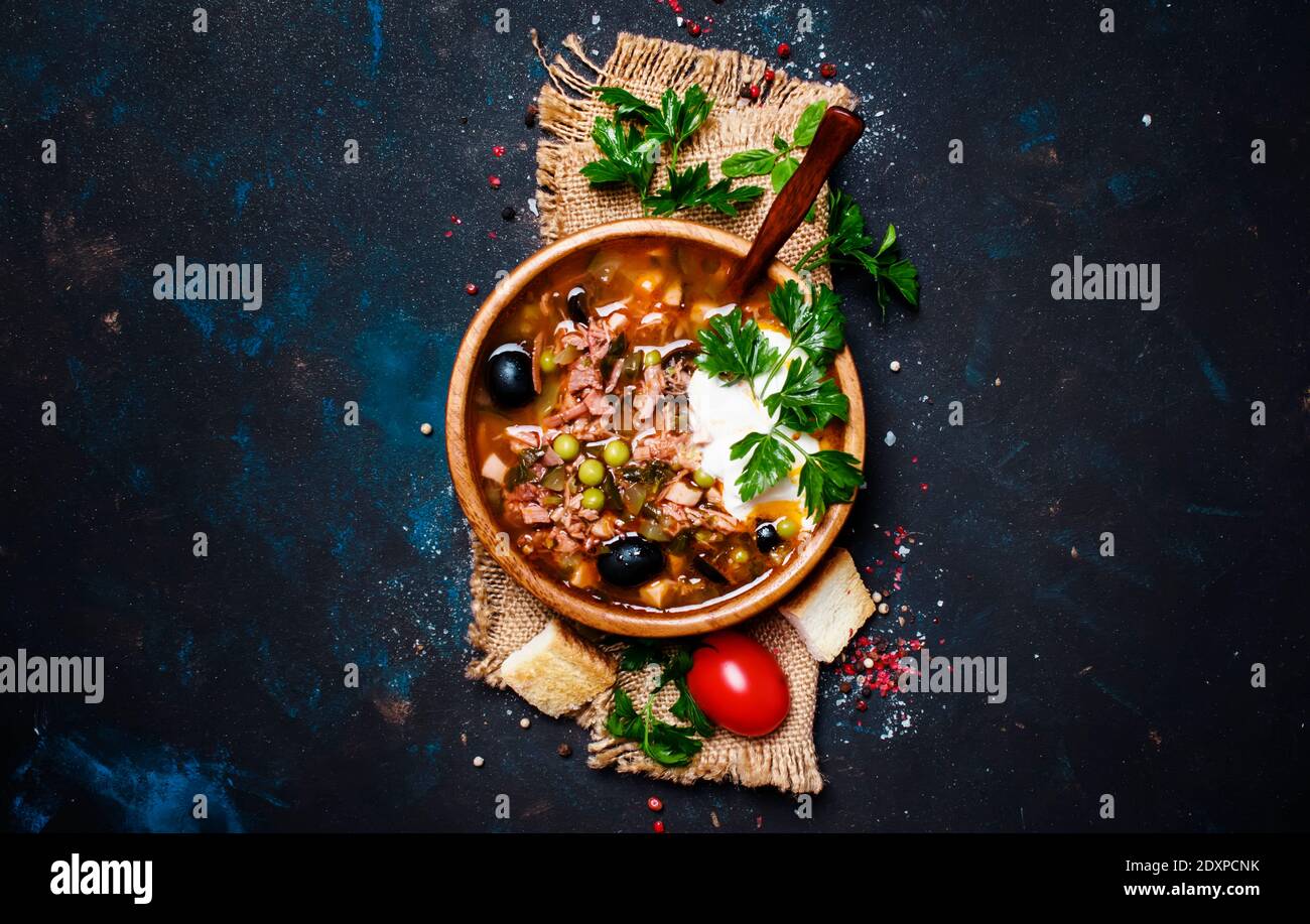 Russian Meat Solyanka Soup In Wooden Bowl, Top View Stock Photo - Alamy