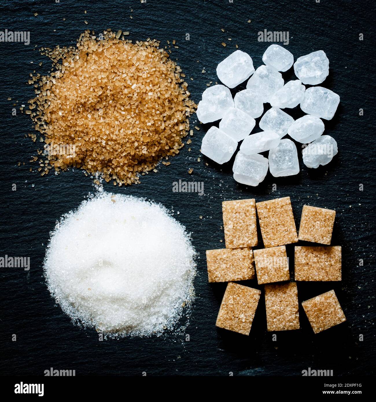Assortment of sugar: white sand, candy sugar, brown sugar into pieces ...