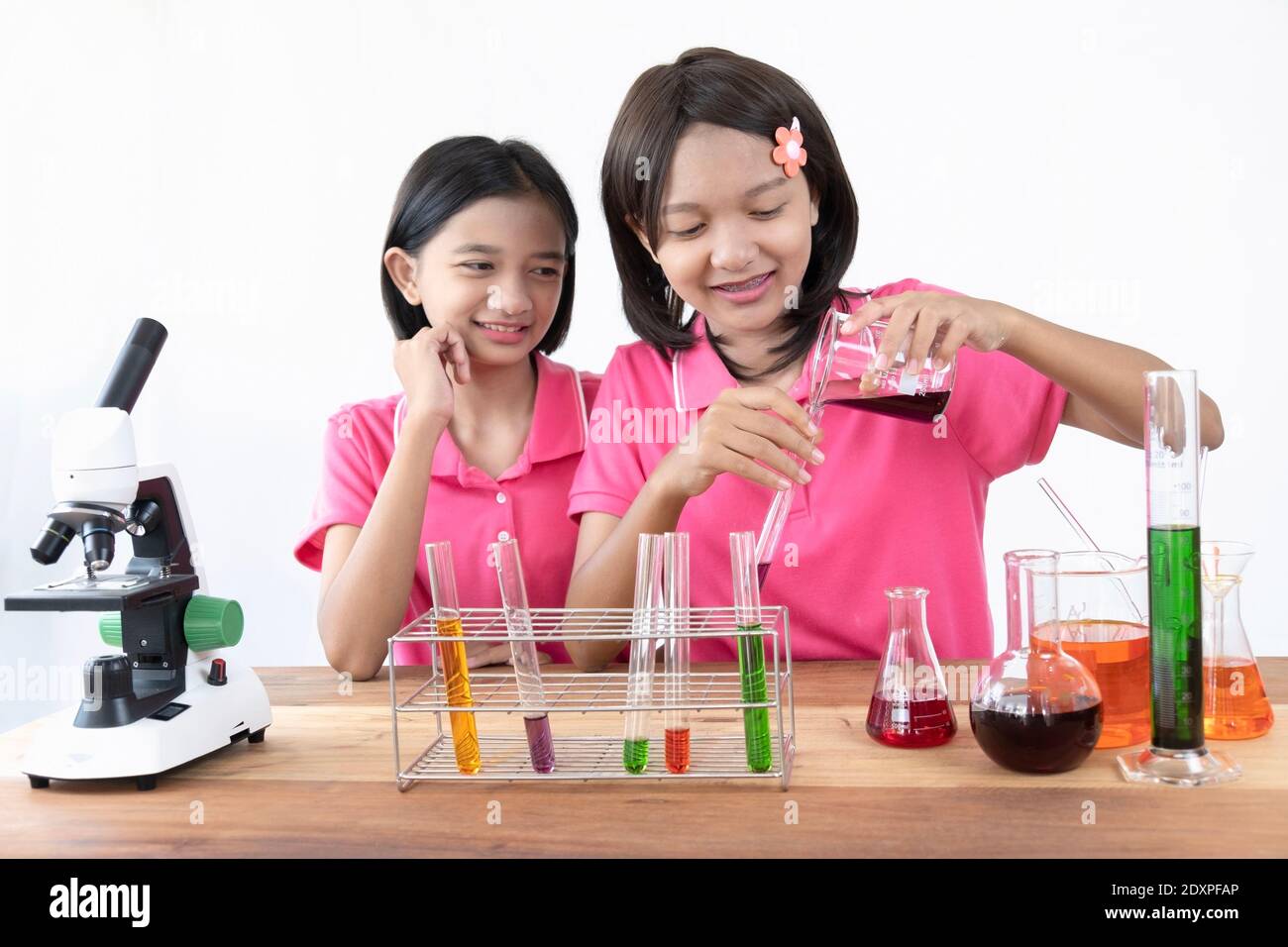Two Girls Doing Science Experiment High Resolution Stock Photography ...