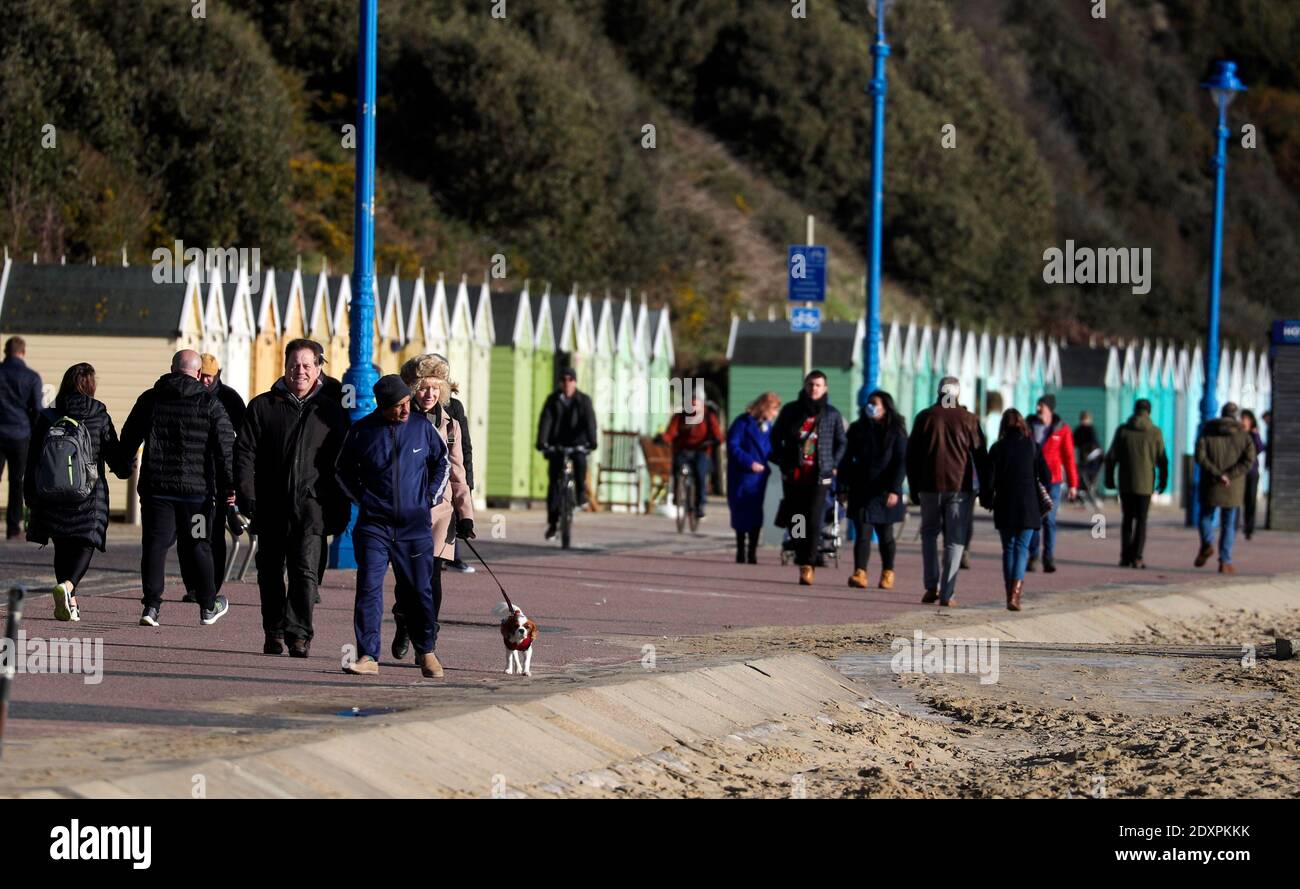 People walk along the beach in Bournemouth Stock Photo - Alamy
