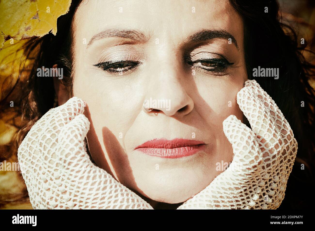 mature woman with melancholic expression II Stock Photo - Alamy