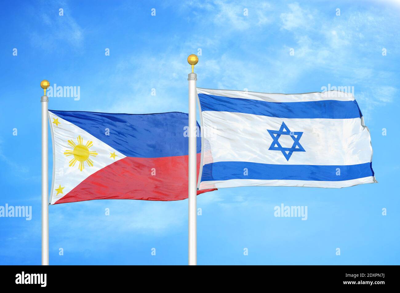 Philippines and Israel two flags on flagpoles and blue cloudy sky Stock ...