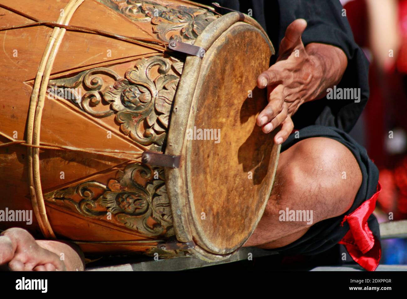 Indonesia holding traditional drum hi-res stock photography and images ...