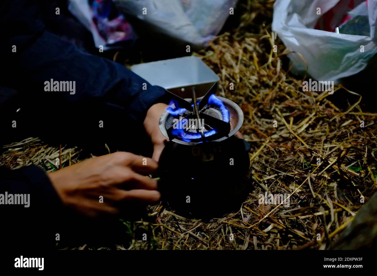 Women stove burning hand hi-res stock photography and images - Alamy