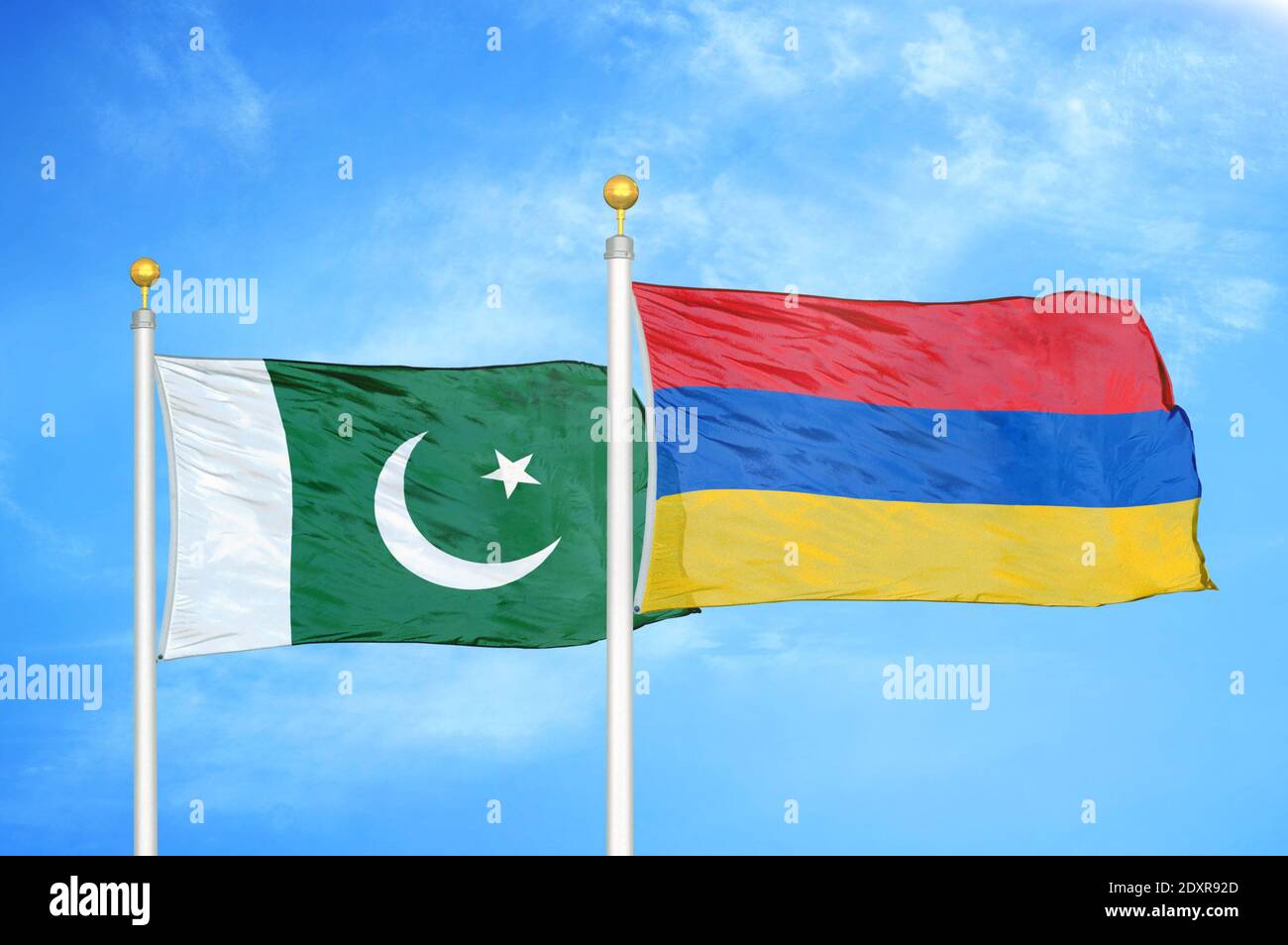 Pakistan and Armenia two flags on flagpoles and blue cloudy sky Stock ...