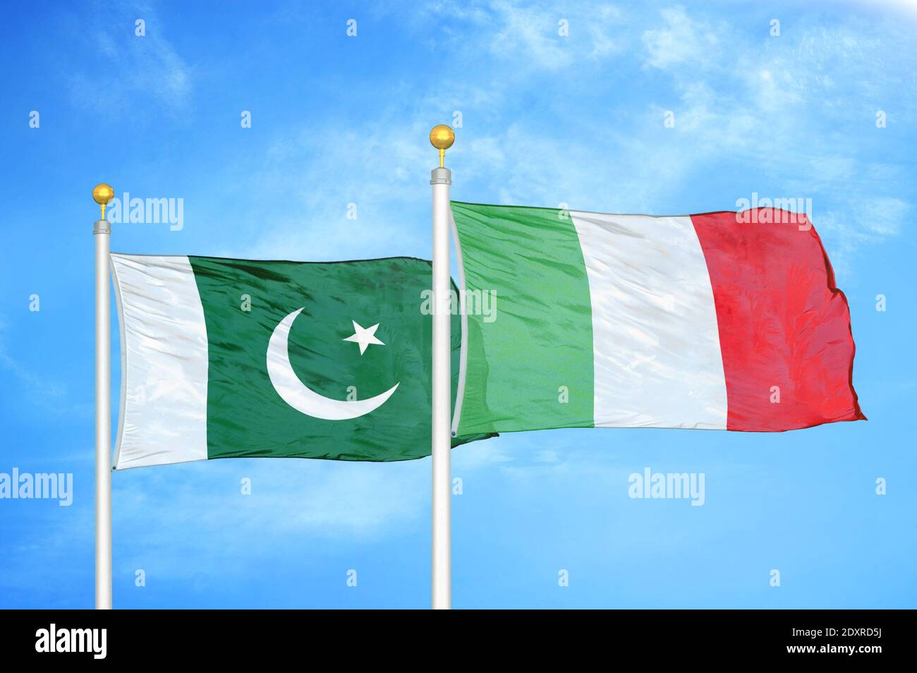 Pakistan and Italy two flags on flagpoles and blue cloudy sky Stock ...