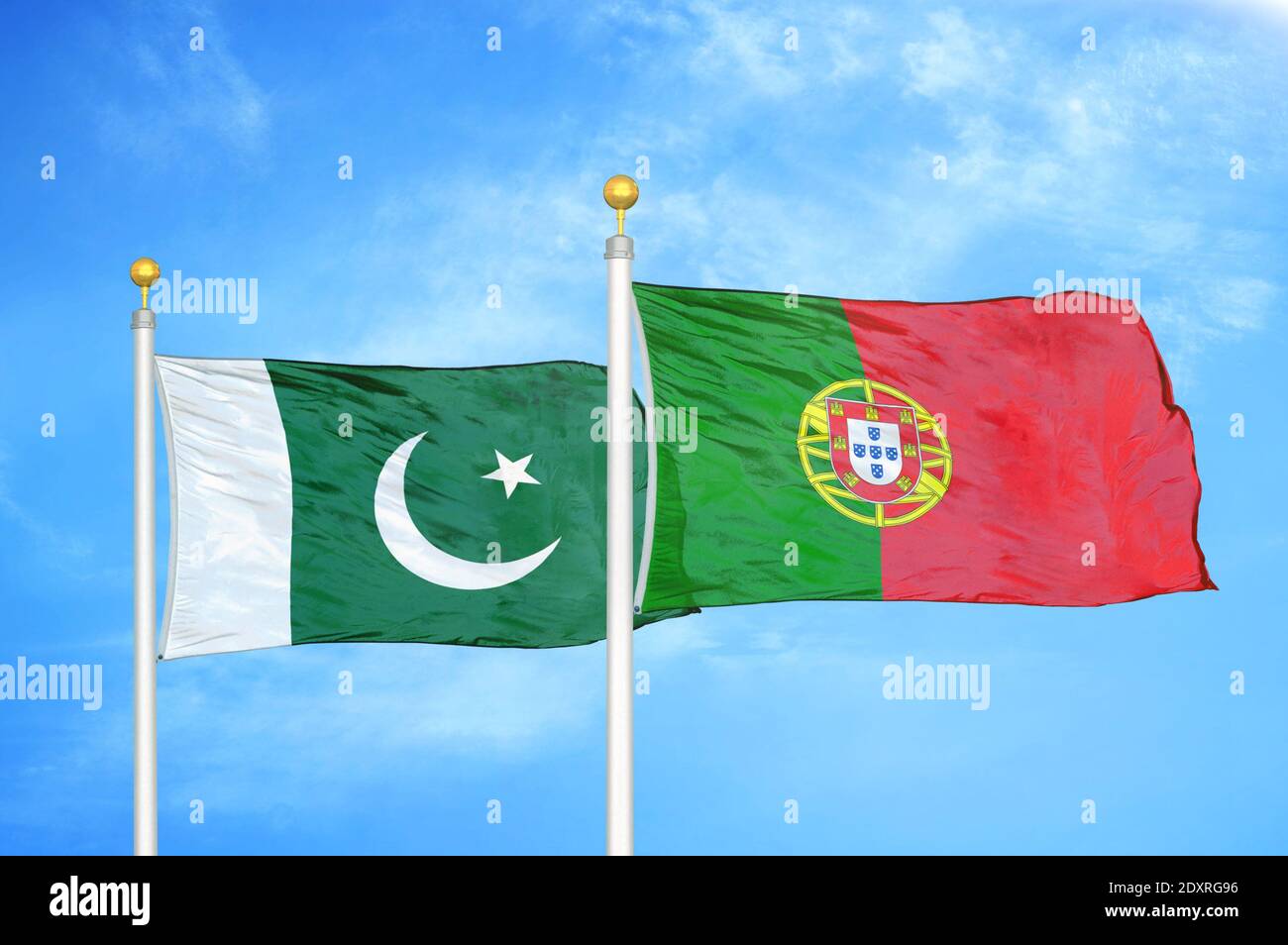 Pakistan and Portugal two flags on flagpoles and blue cloudy sky Stock ...