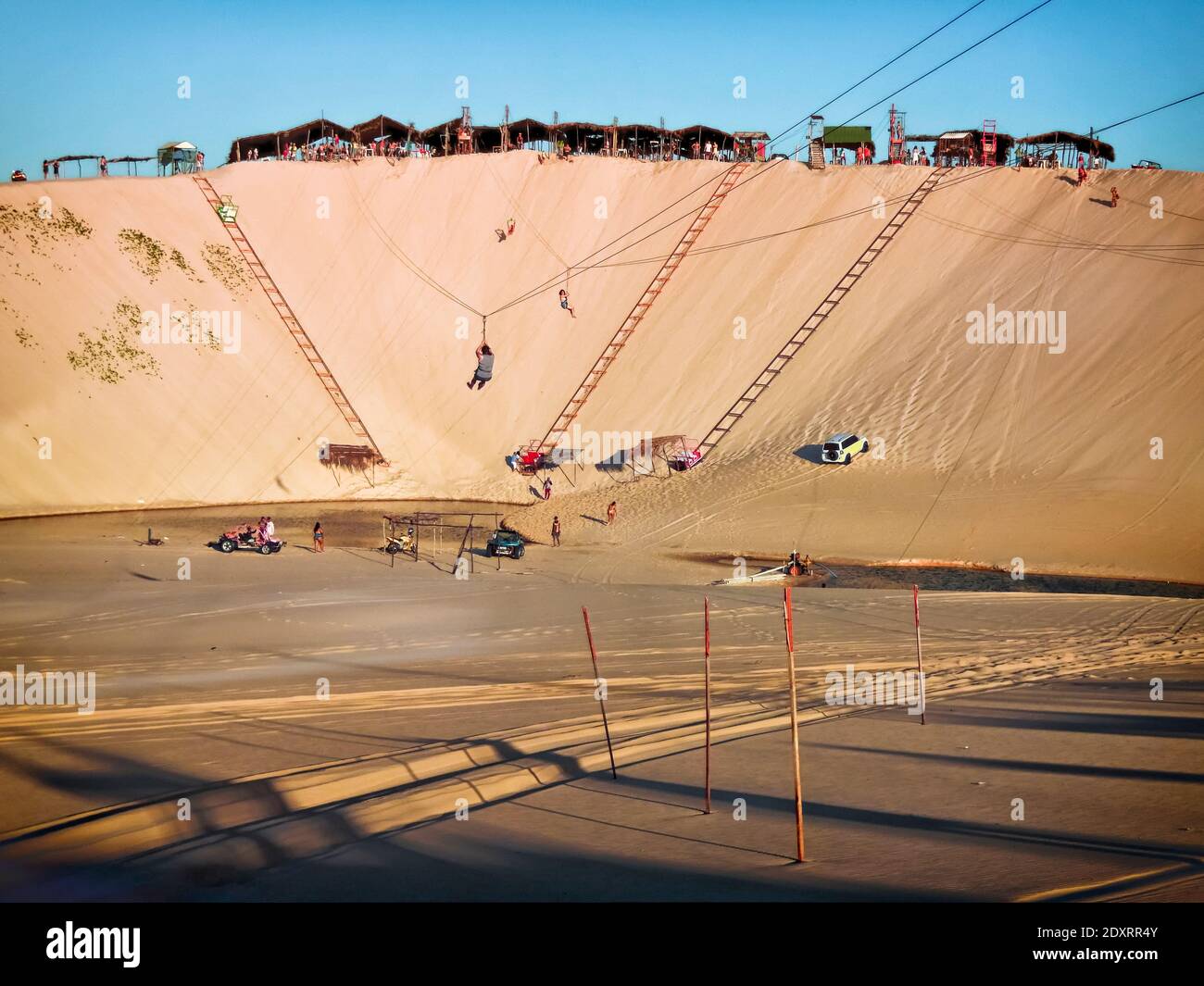 Men swinging on ropes hi-res stock photography and images - Alamy